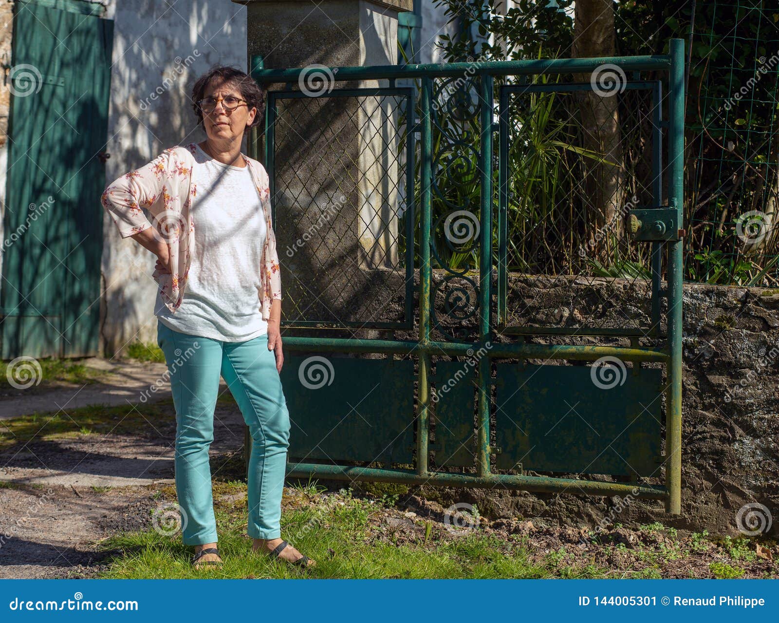 Charming Senior Woman Standing in the Park Stock Image - Image of ...