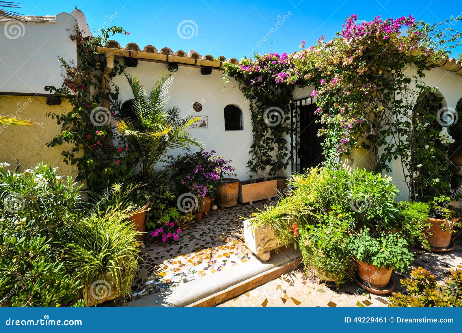 Charming Spanish courtyard stock image. Image of turquoise - 49229461