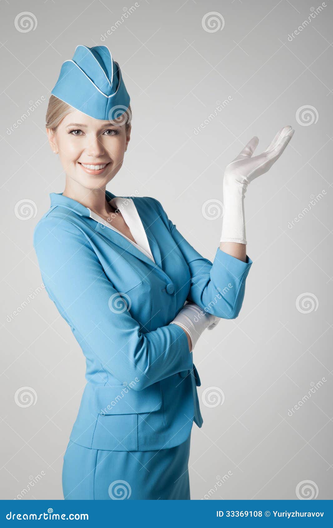 Charming Stewardess in Blue Uniform Pointing on Gray Bac Stock Photo ...