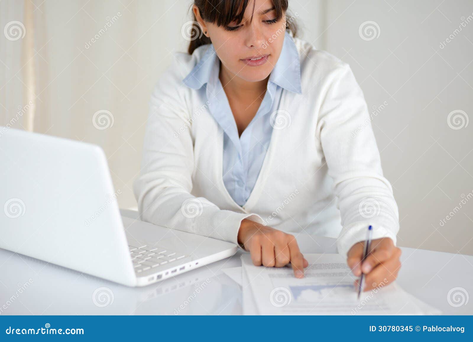 Charming Young Female Reading Documents at Office Stock Image - Image ...