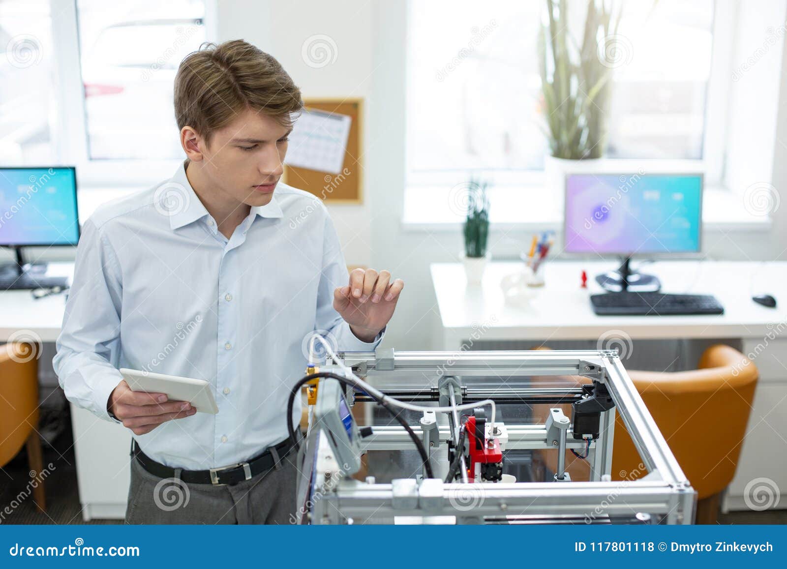 Charming Young Man Observing Mechanism of 3D Printer Stock Photo ...