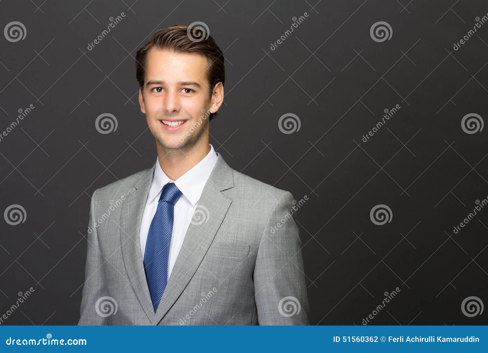A Charming Young Man on a Suit Stock Photo - Image of expressing ...