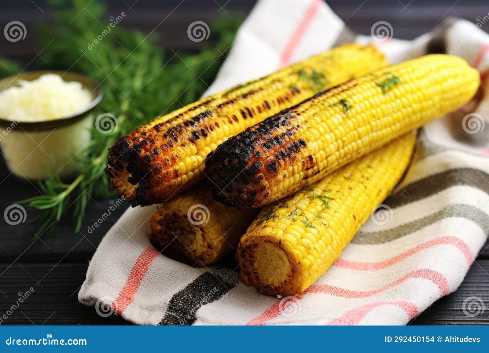 Charred Corn on the Cob with a Napkin Stock Photo - Image of charred ...