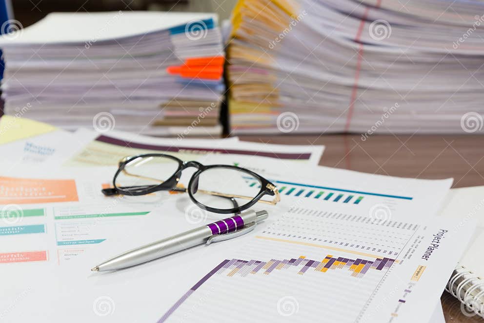 Chart and Paperwork on Office Table Stock Image - Image of earnings ...