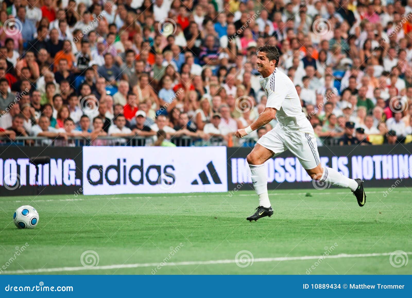 Chasing the Ball editorial stock image. Image of field - 10889434