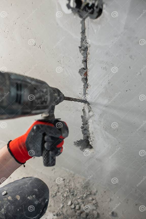 Chasing the Wall for the Installation of an Electrical Cable Stock ...