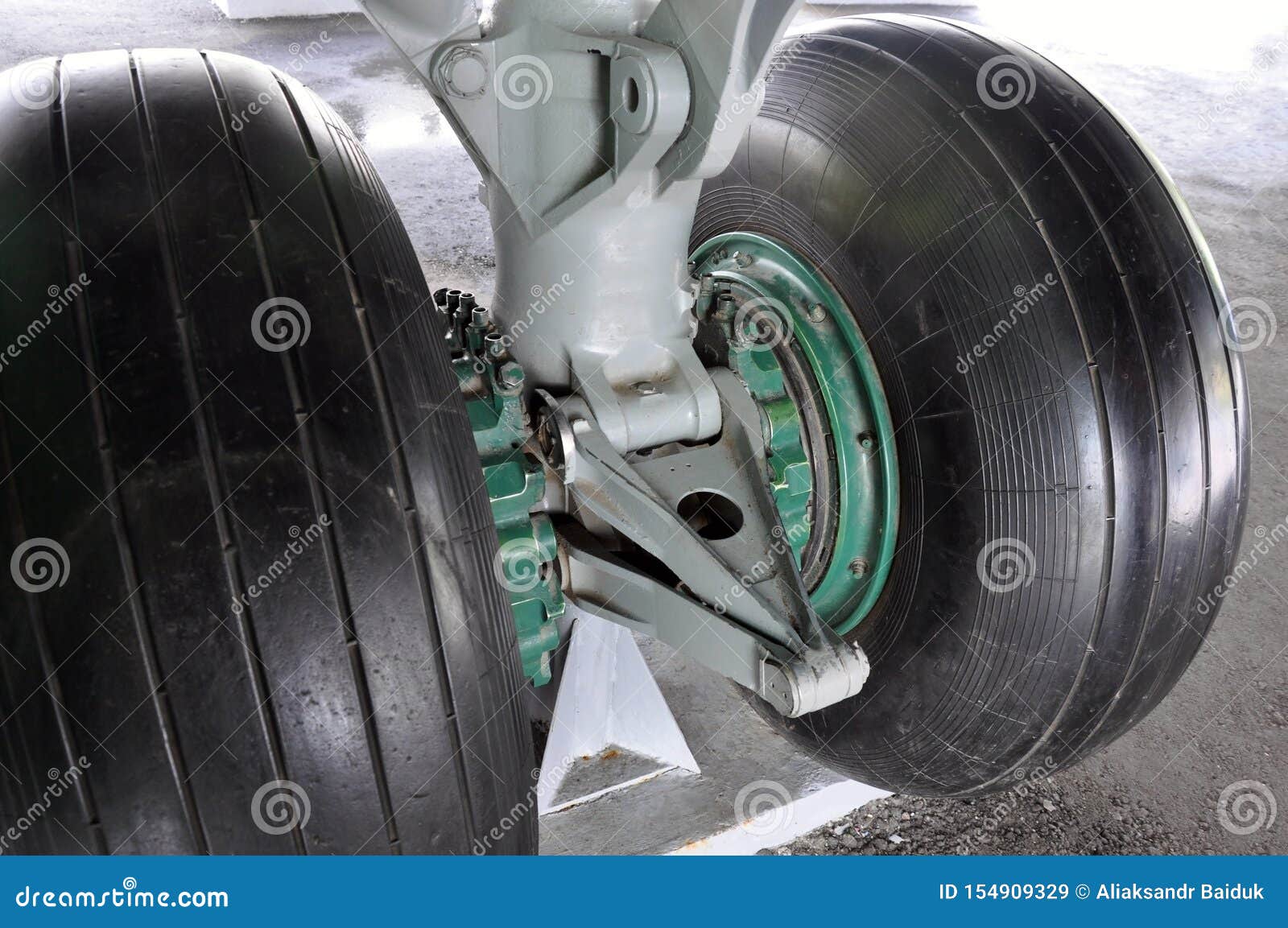 The Chassis of the Aircraft in the Process of Parking on the Runway ...