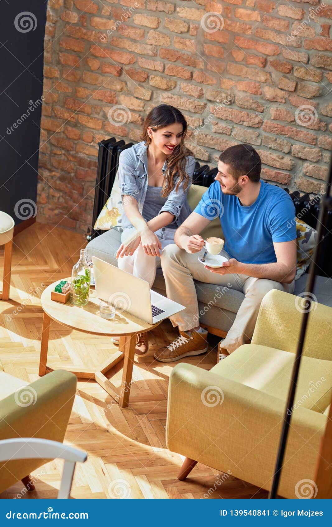 Chat with coffee in pub stock image. Image of adult - 139540841