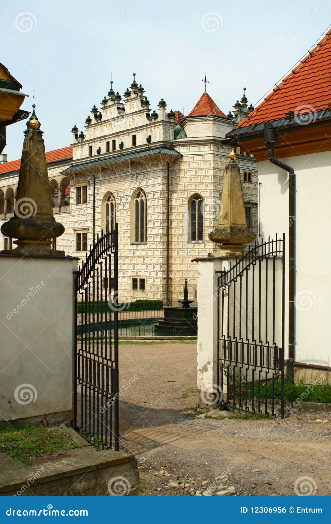 Chateau entrance gate stock photo. Image of stone, flowers - 12306956