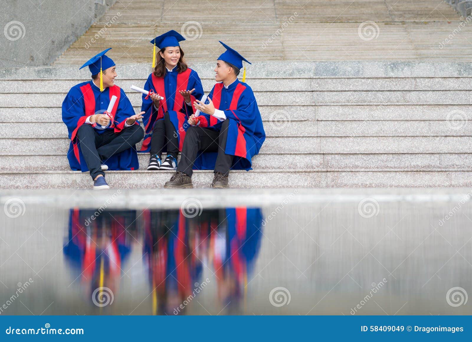 Chatting graduates stock image. Image of copyspace, sitting - 58409049
