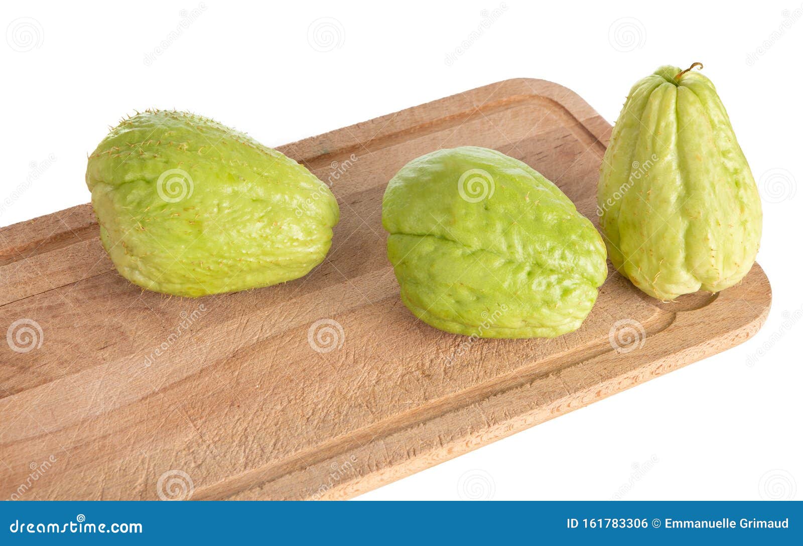 Chayote on a cutting board stock photo. Image of board - 161783306