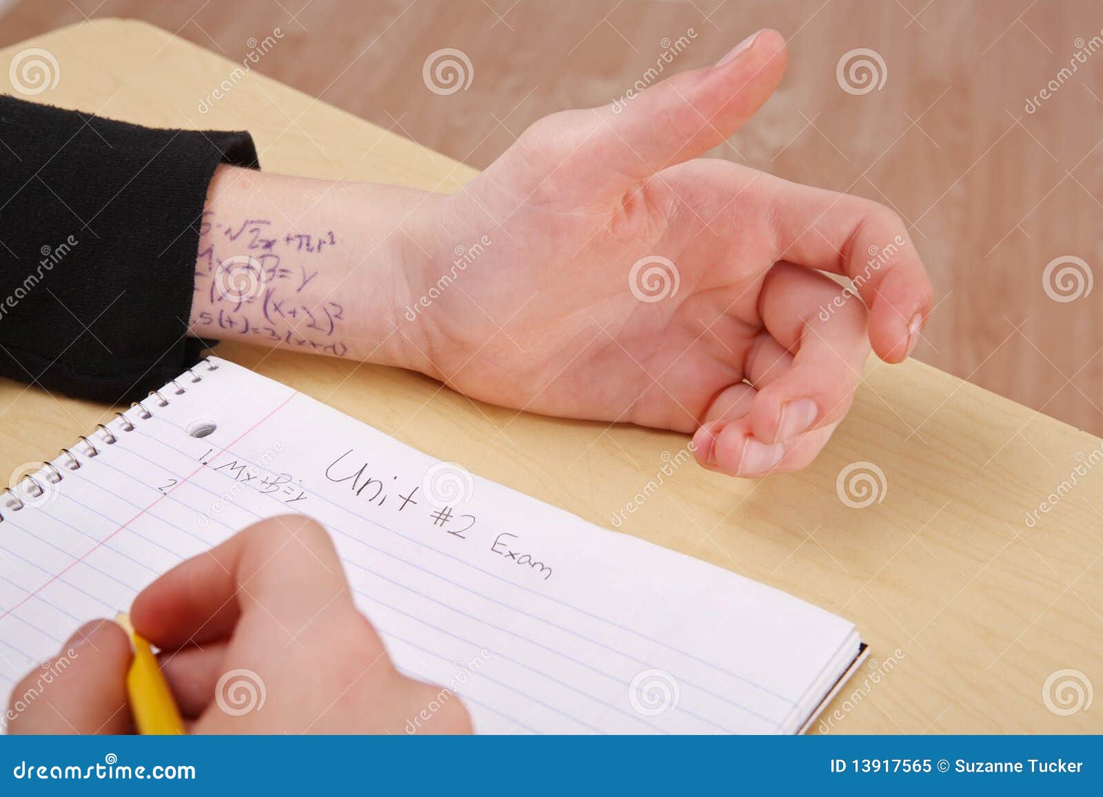 Cheating on a test stock image. Image of notebook, child - 13917565