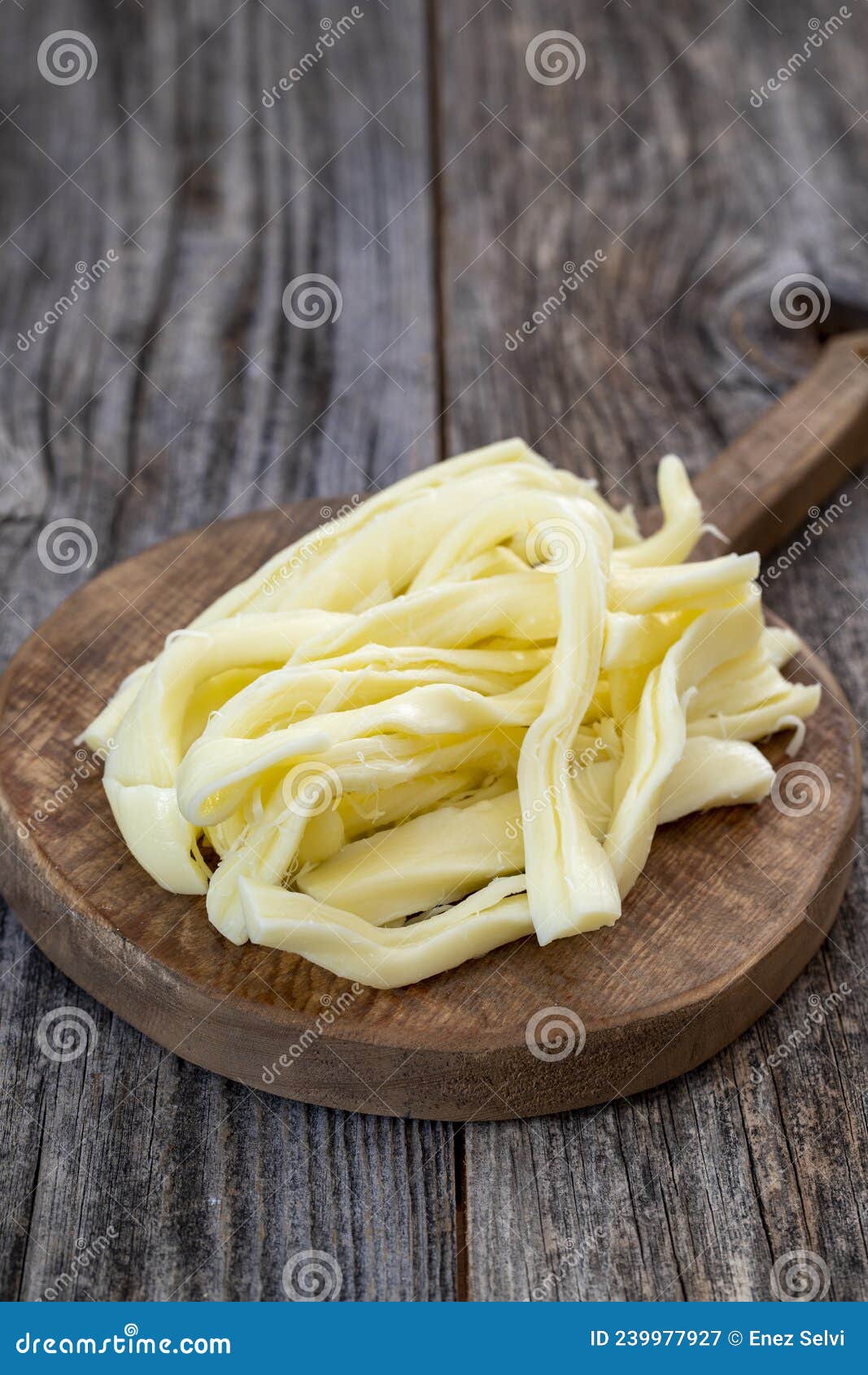 Chechil Cheese or String Cheese on Wood Floor. Stock Image - Image of ...