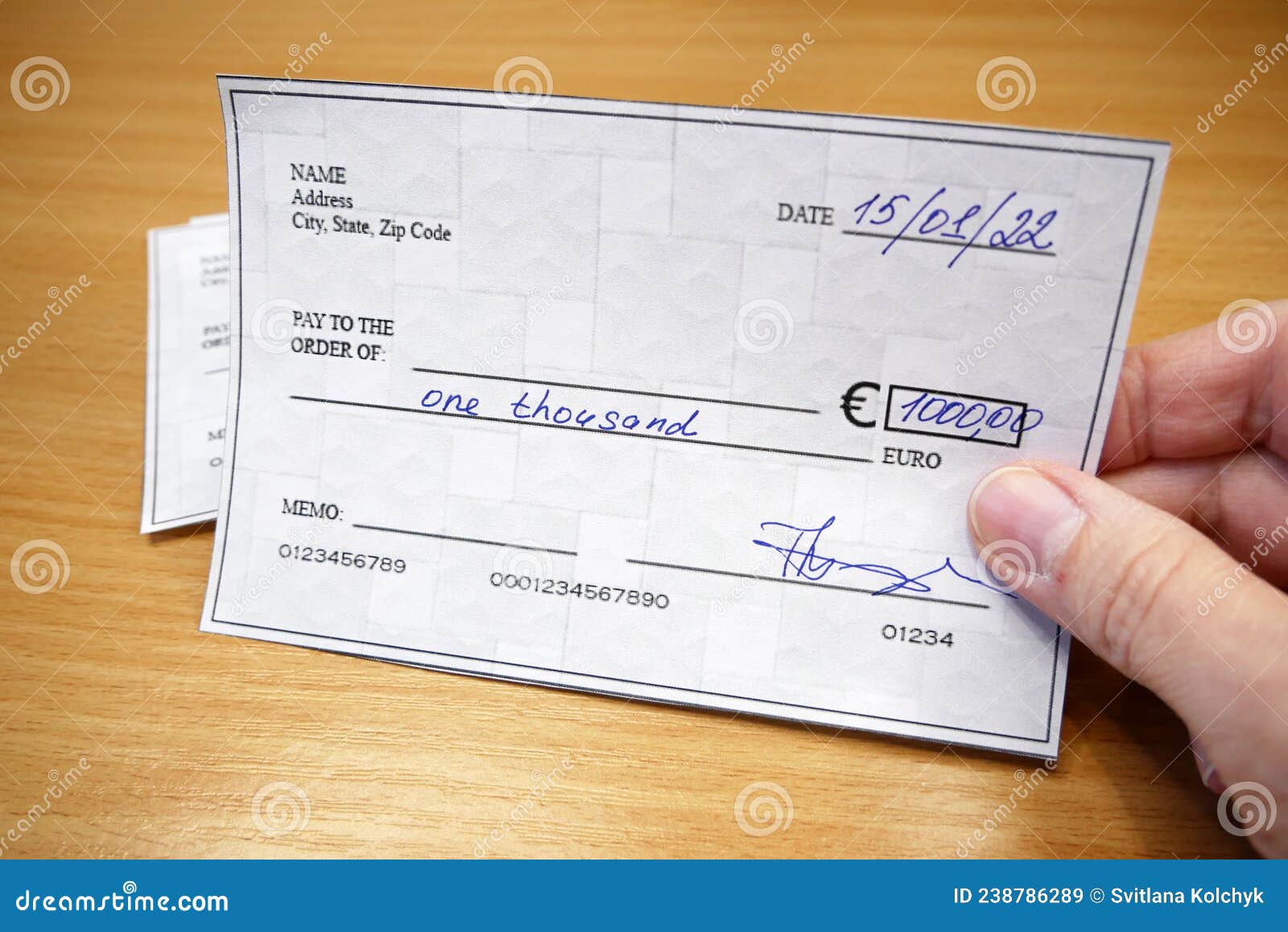 Check Financial Payment, Paycheck in Hand on Table Background, Hand ...