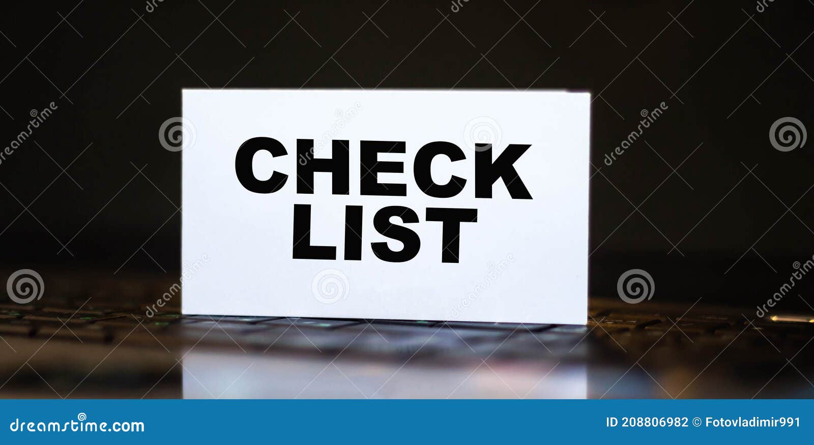 CHECK LIST on Paper on the Table by the Computer Stock Photo - Image of ...