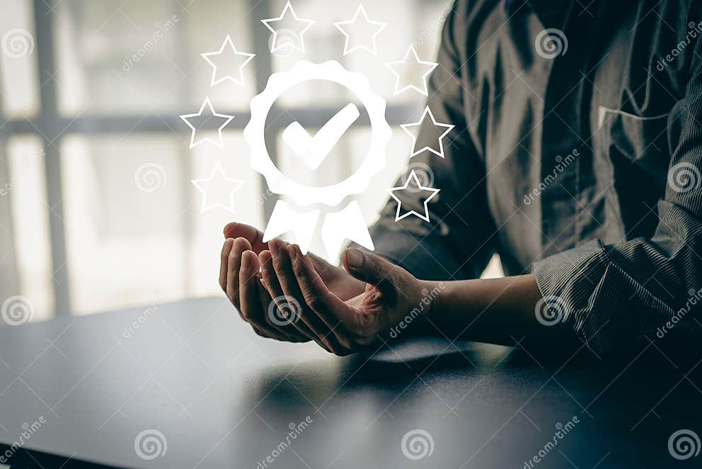 A Check Mark in Hand with a Star Shows a Virtual Approved Check Mark ...