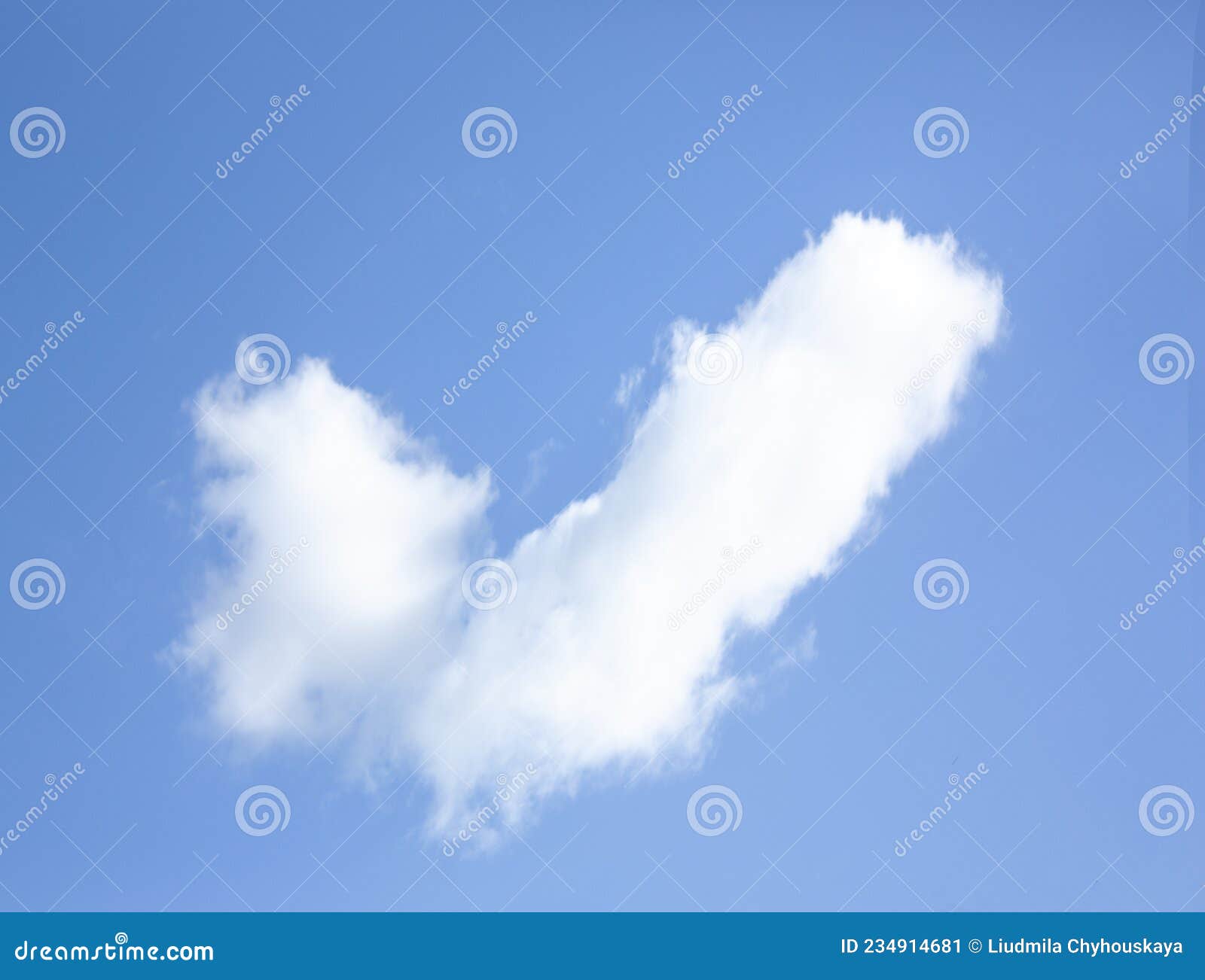 A Check Mark-shaped Cloud Against a Blue Sky Background. Clouds in the ...