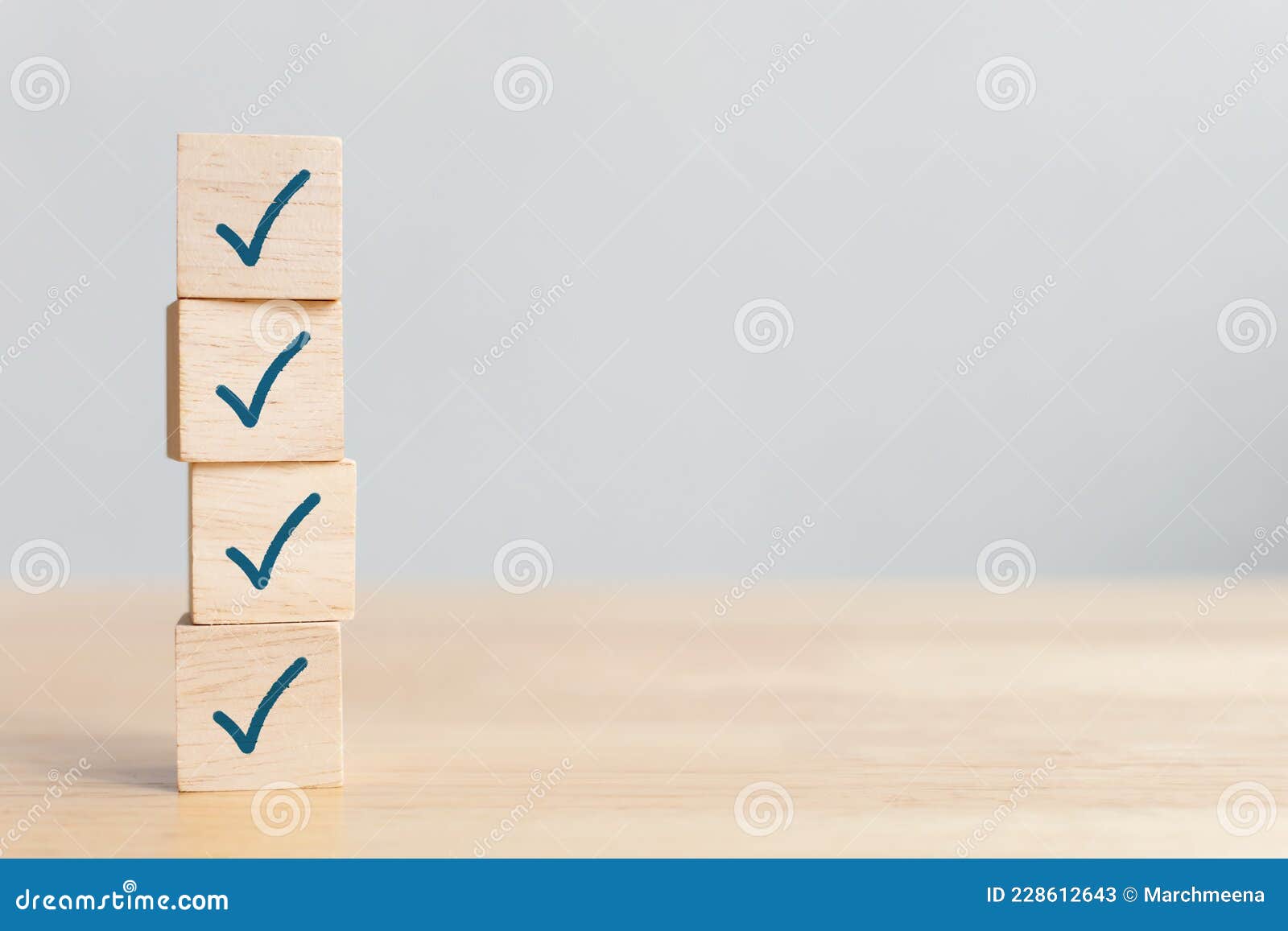 Check Mark on Wooden Blocks on Table with Copy Space Stock Image ...