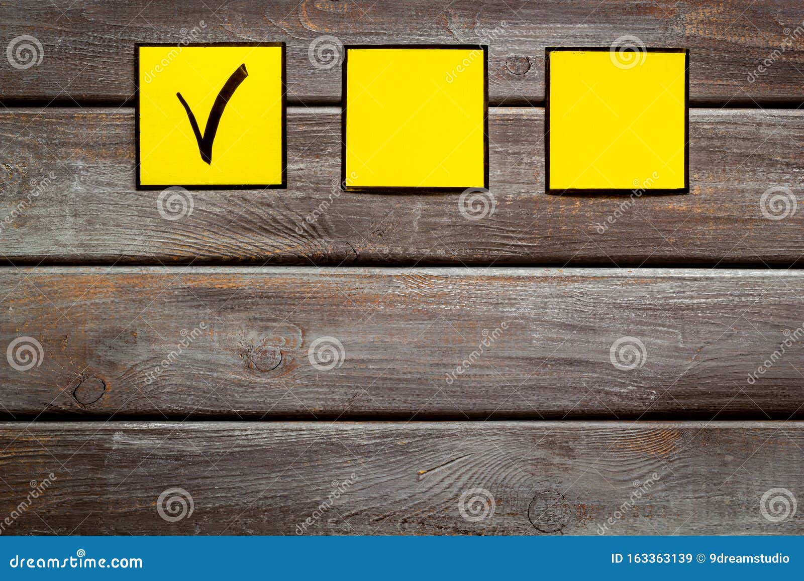 Check Mark in Yellow Check-box on Dark Wooden Background Top View Copy ...