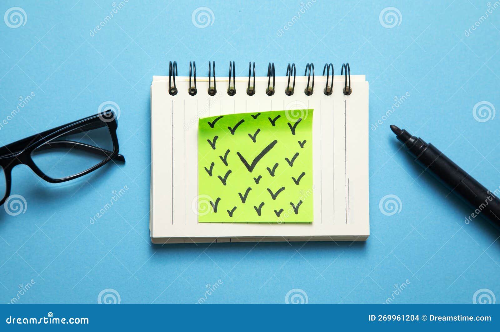 Check Marks on Sticky Note on the Blue Background Stock Photo - Image ...