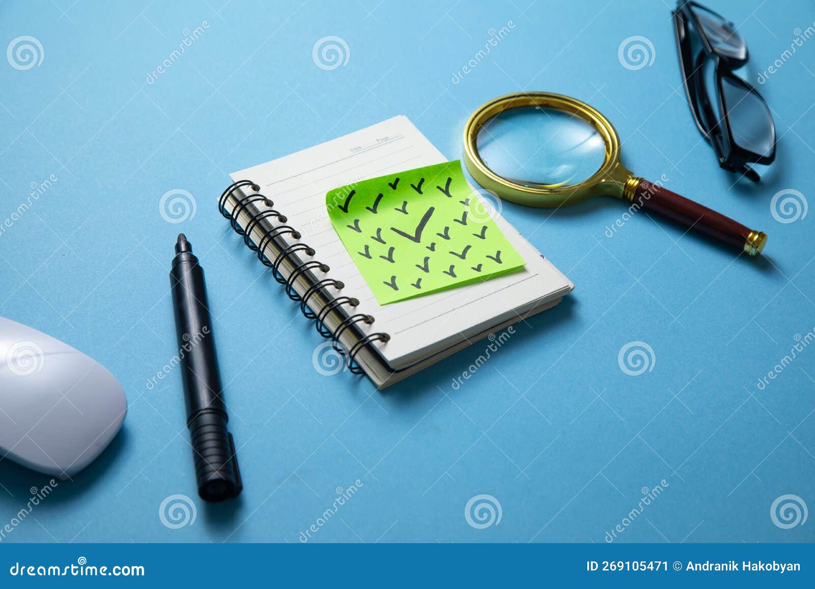 Check Marks on Sticky Note with a Business Objects on the Blue ...