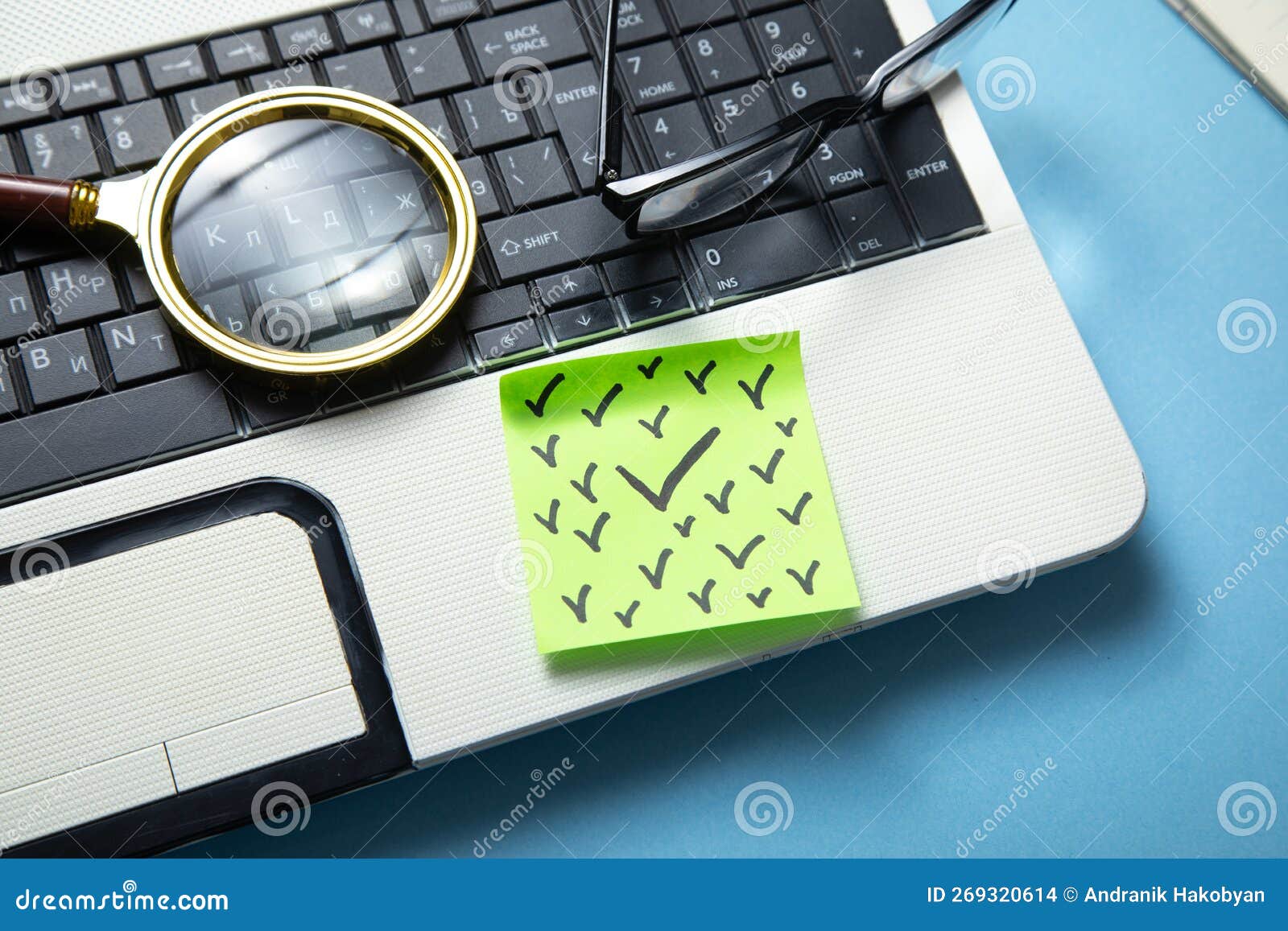 Check Marks on Sticky Note on the Laptop Keyboard Stock Photo - Image ...