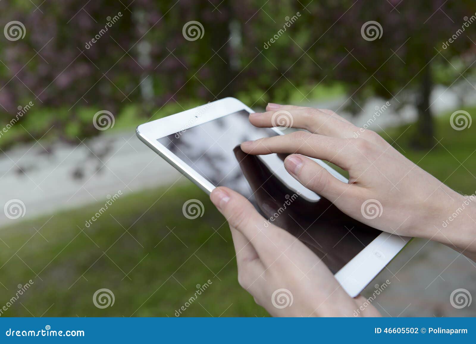 Check the Tablet during Walking on the Street Side Look Editorial ...