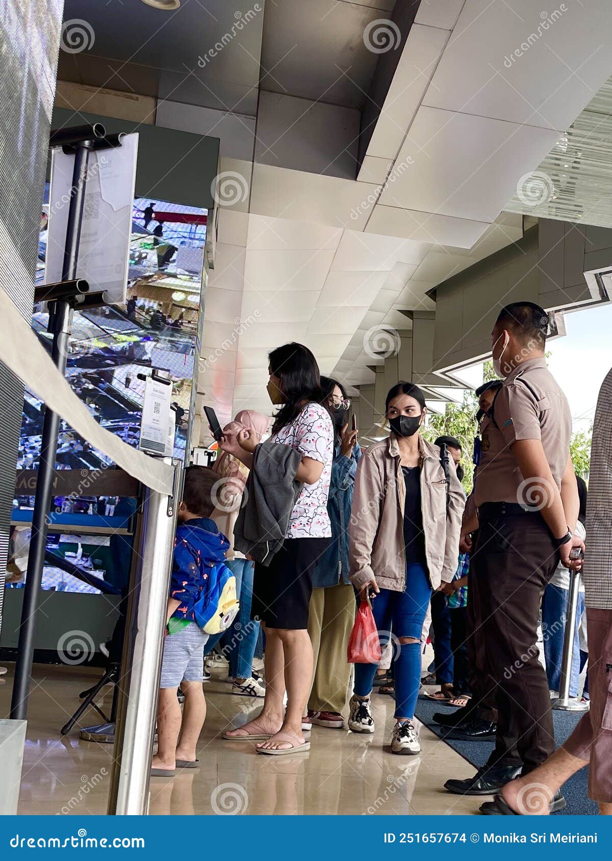 Check in to enter the mall editorial stock image. Image of guard ...