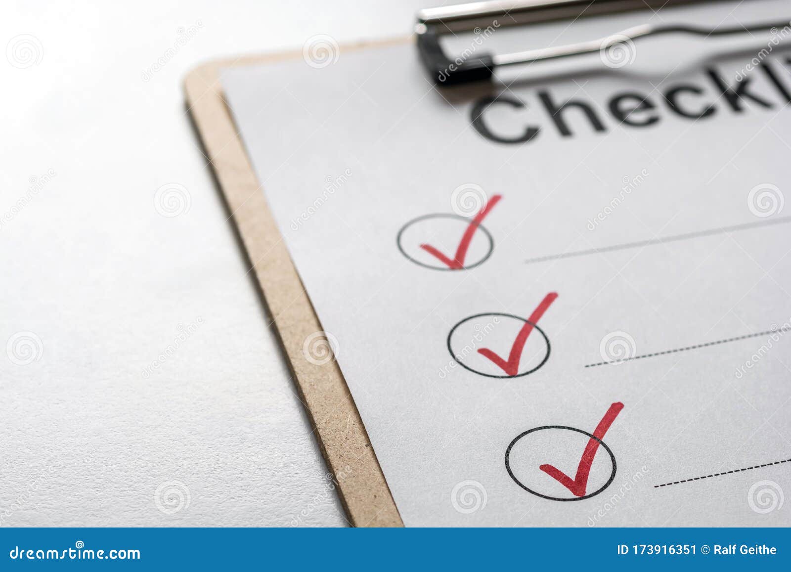 Checked Checklist on a Clipboard is on a Bright Desk Stock Image ...