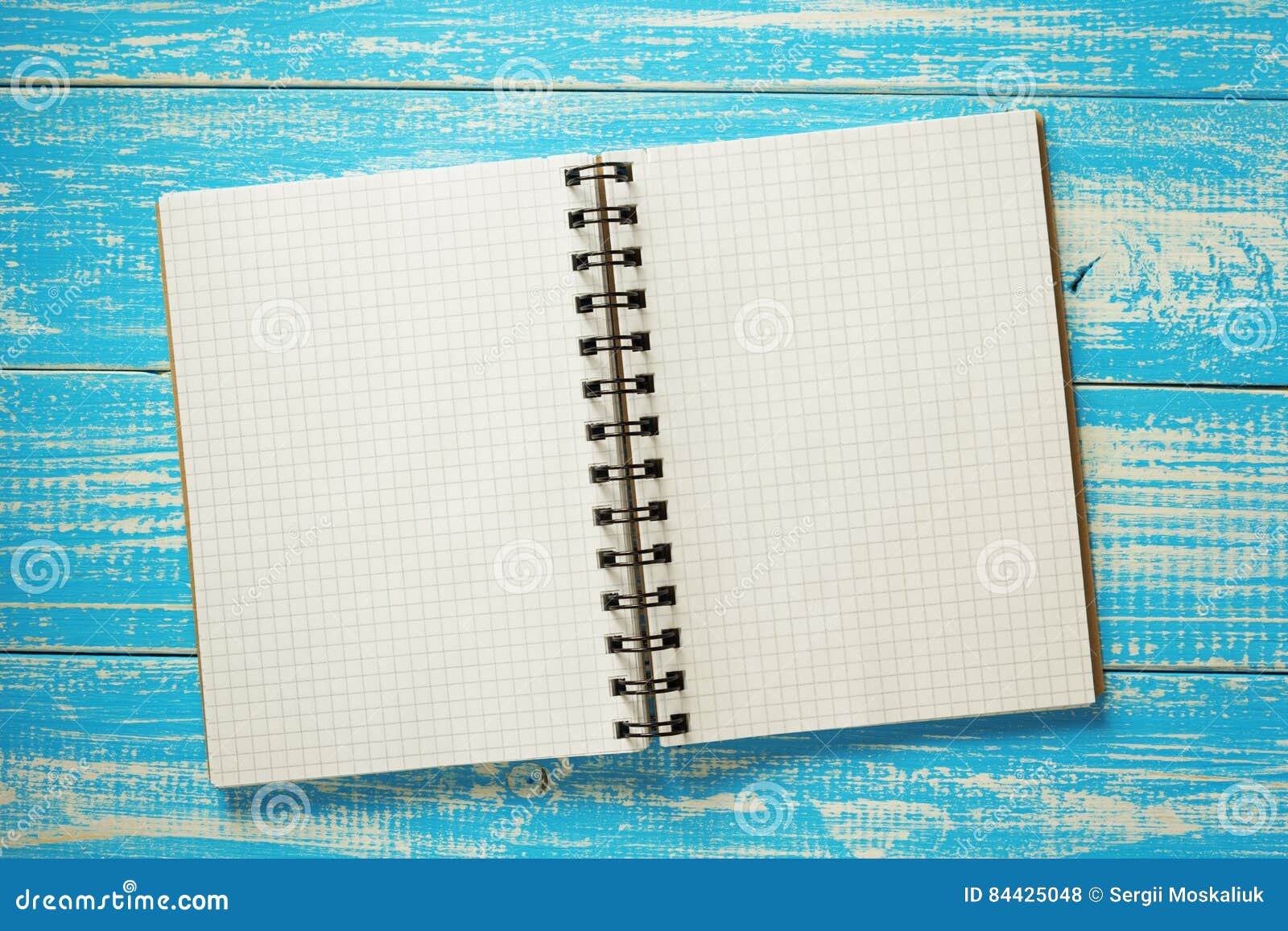 Checked notebook on wood stock photo. Image of book, notepad - 84425048
