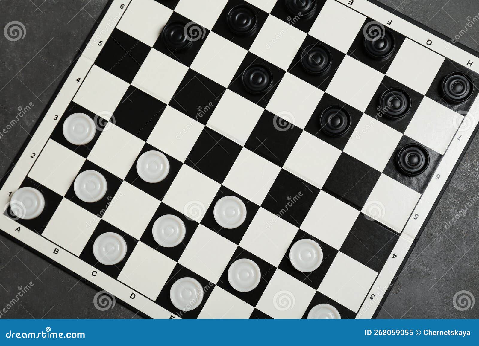 Checkerboard with Game Pieces on Grey Table, Top View Stock Image ...