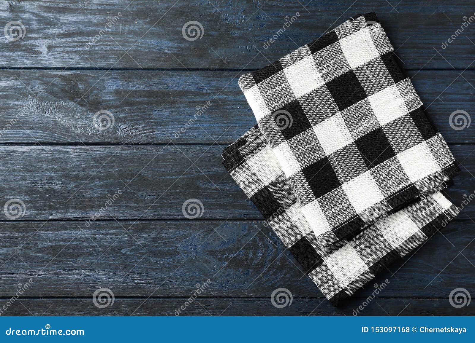 Checkered Kitchen Towels on Blue Wooden Table. Space for Text Stock ...