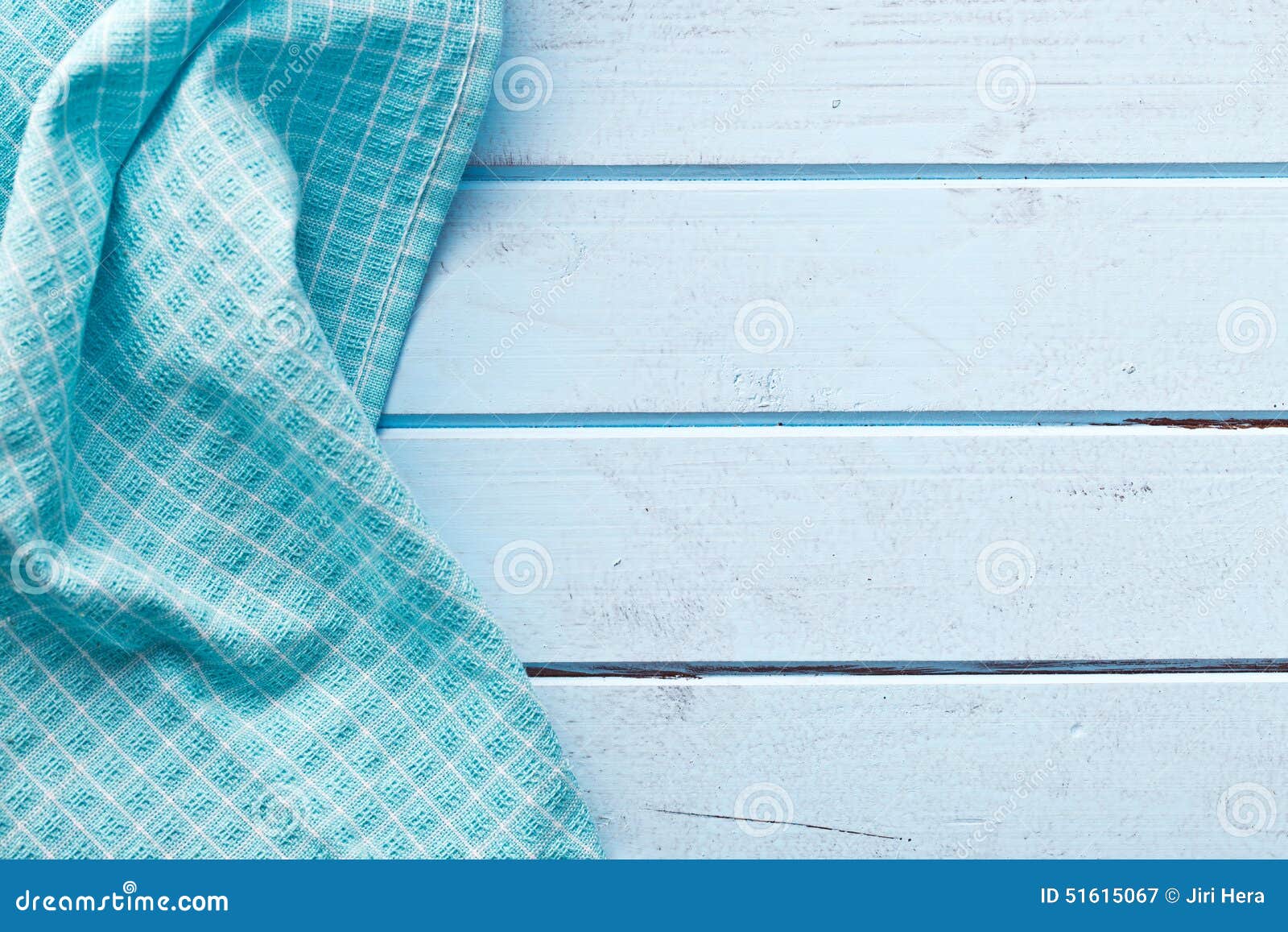 Checkered Napkin on Blue Table Stock Image - Image of backdrop ...