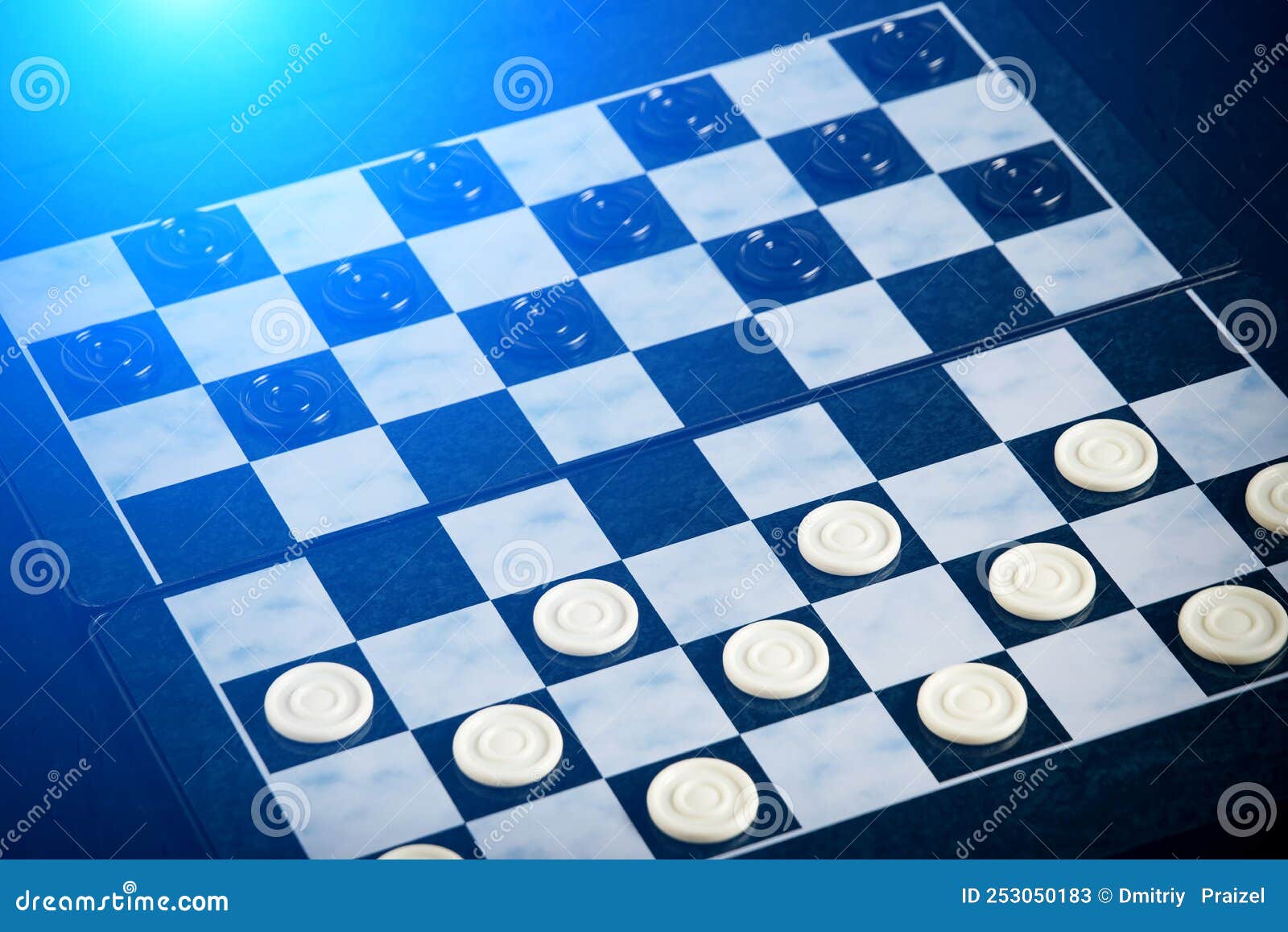 Checkers Board with Checkers Illuminated with Bright Blue Light Stock ...