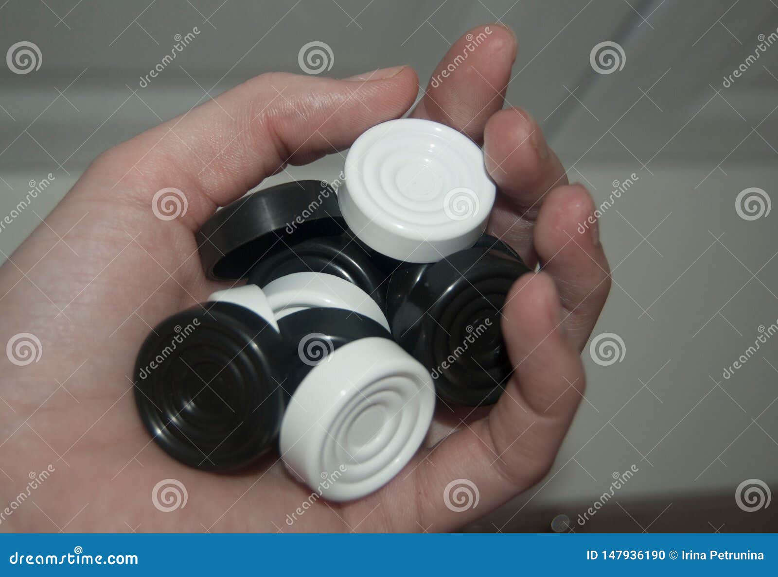 Checkers in hand stock photo. Image of game, checkers - 147936190