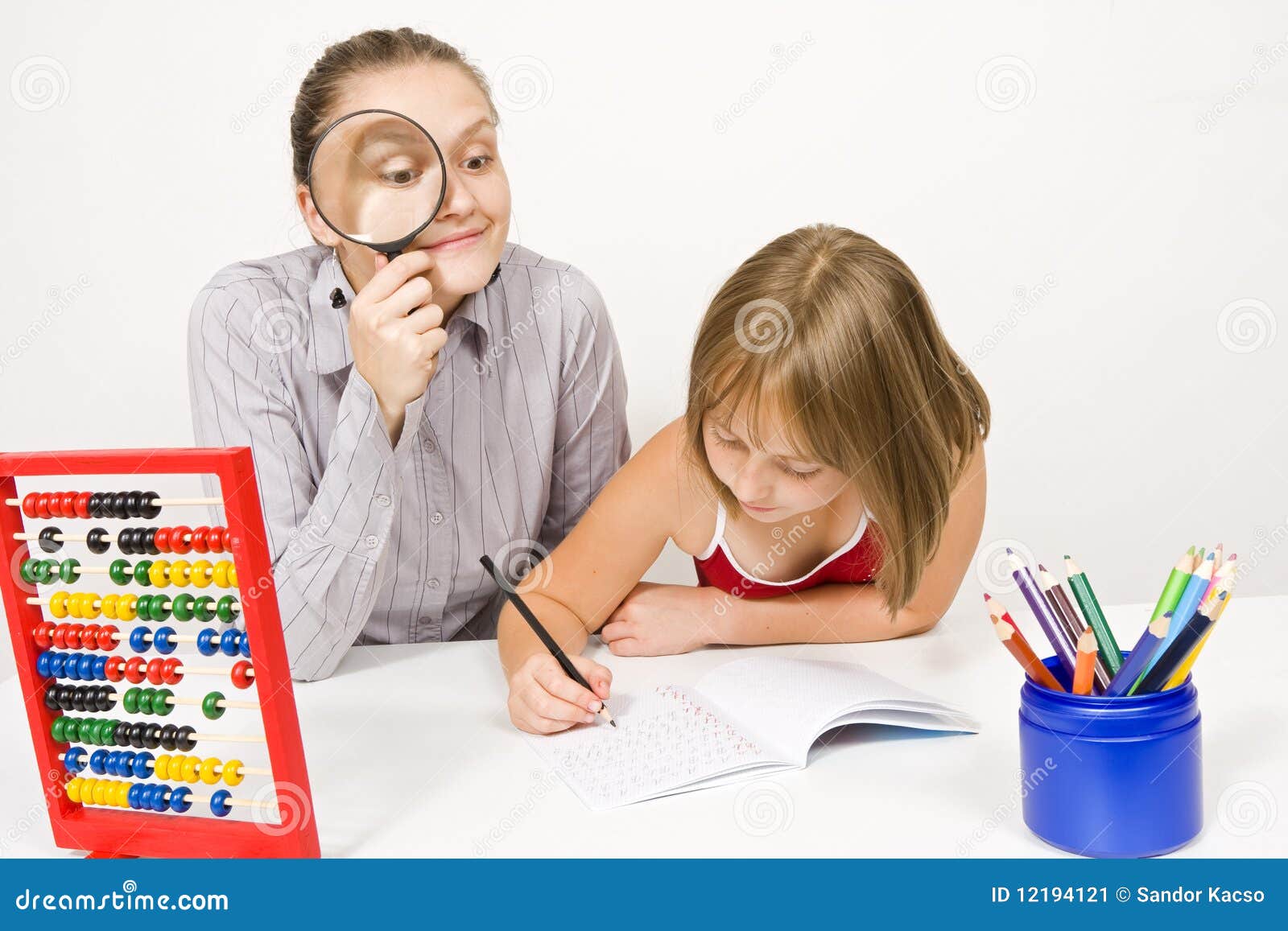 Checking the activity stock image. Image of female, classroom - 12194121