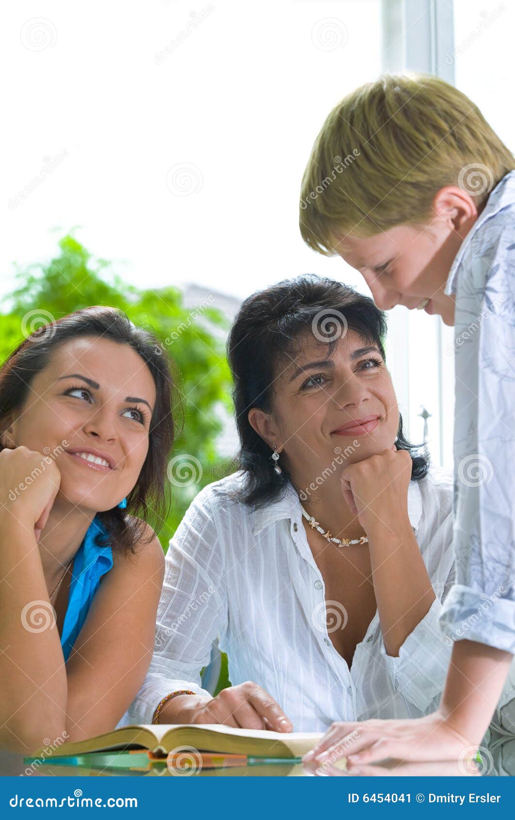 Checking a book stock image. Image of people, smile, home - 6454041