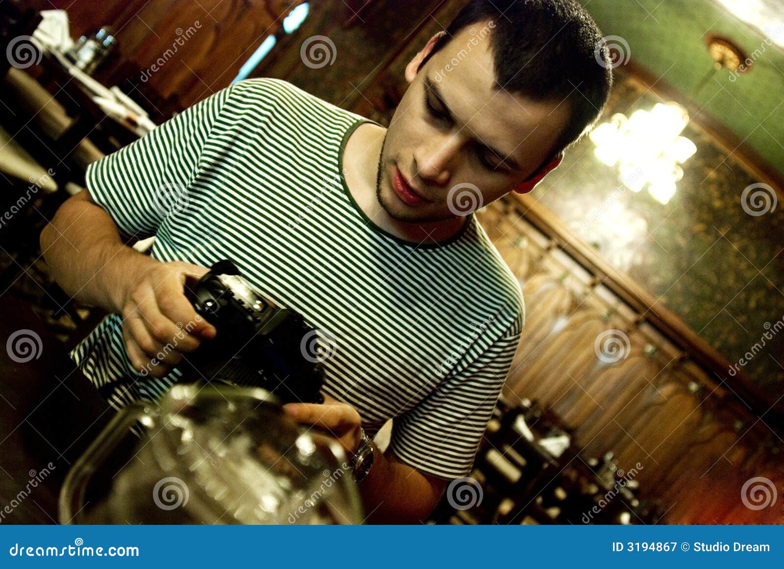 Checking Camera in Restaurant Stock Image - Image of inspect, grip: 3194867