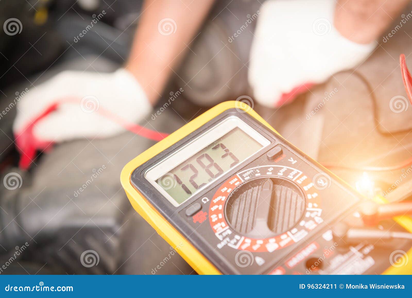 Checking Car Battery Voltage Stock Image - Image of hand, electrical ...