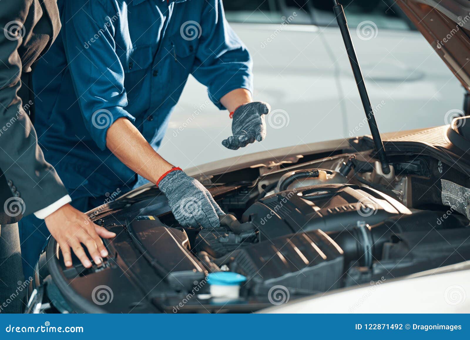 Checking car engine stock photo. Image of mechanic, hand - 122871492
