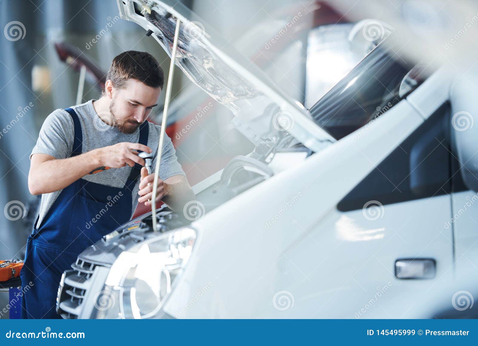 Checking car engine stock image. Image of specialist - 145495999