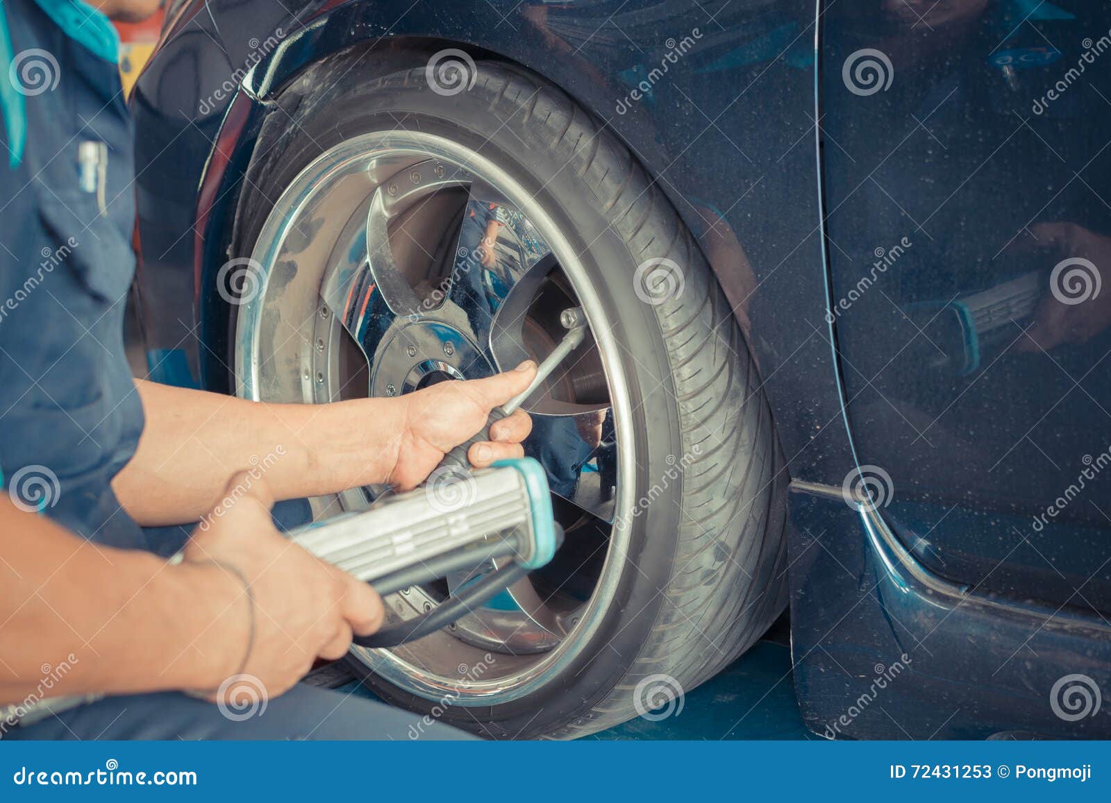 Checking Car Suspension and Tire Pressure Stock Image - Image of ...