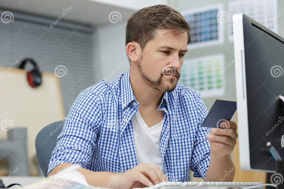 Checking Colour Swatch Reference in Computer Stock Photo - Image of ...