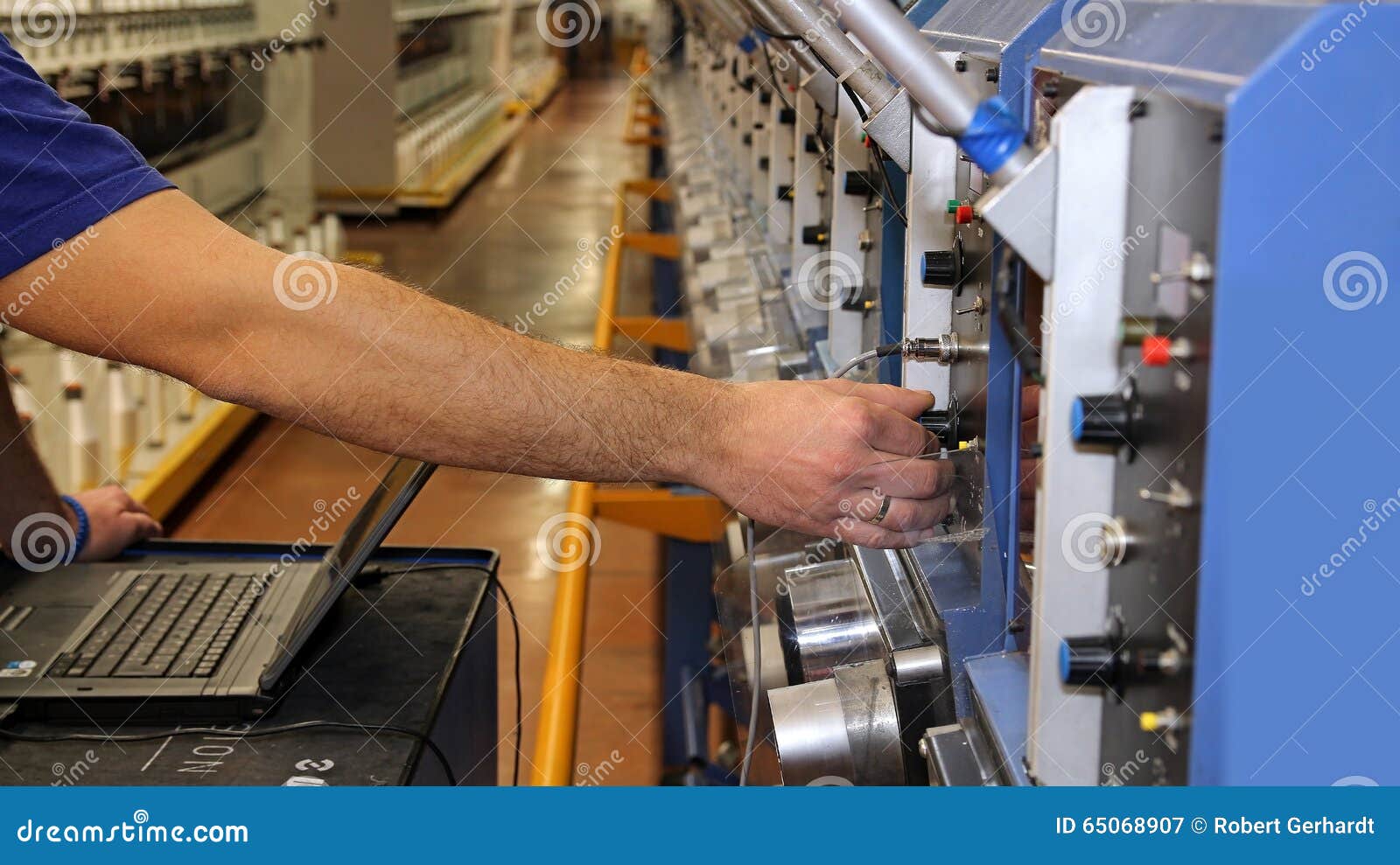 Checking Computerized Machine Status with Laptop Computer Stock Image ...