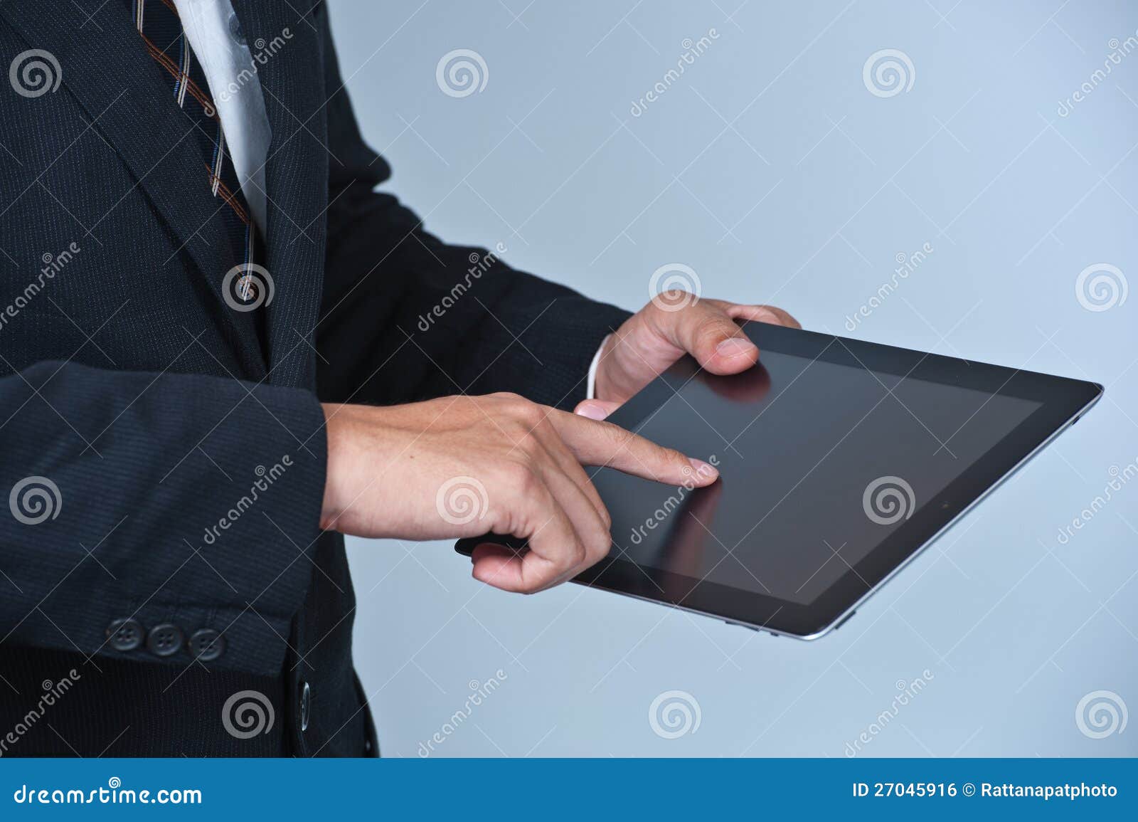 Checking on digital tablet stock photo. Image of laptop - 27045916