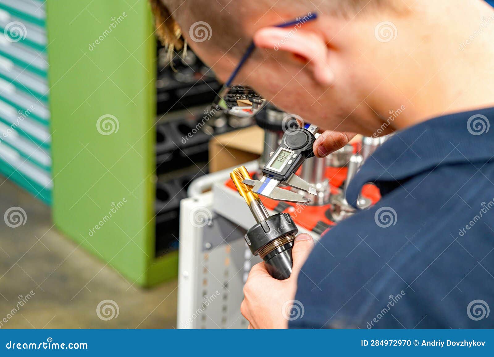 Checking the Dimensions of the Cutting Tool with a Caliper for ...