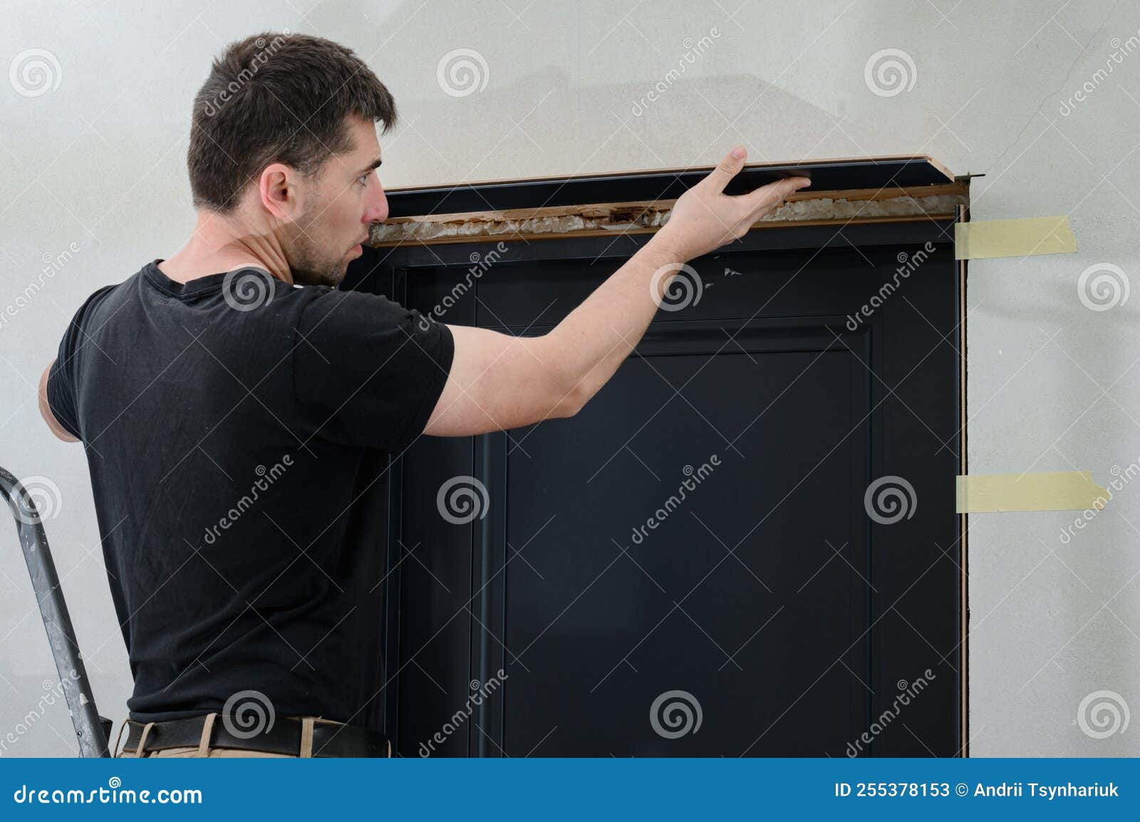 Checking the Door Frame for Evenness of the Surface after Installation ...