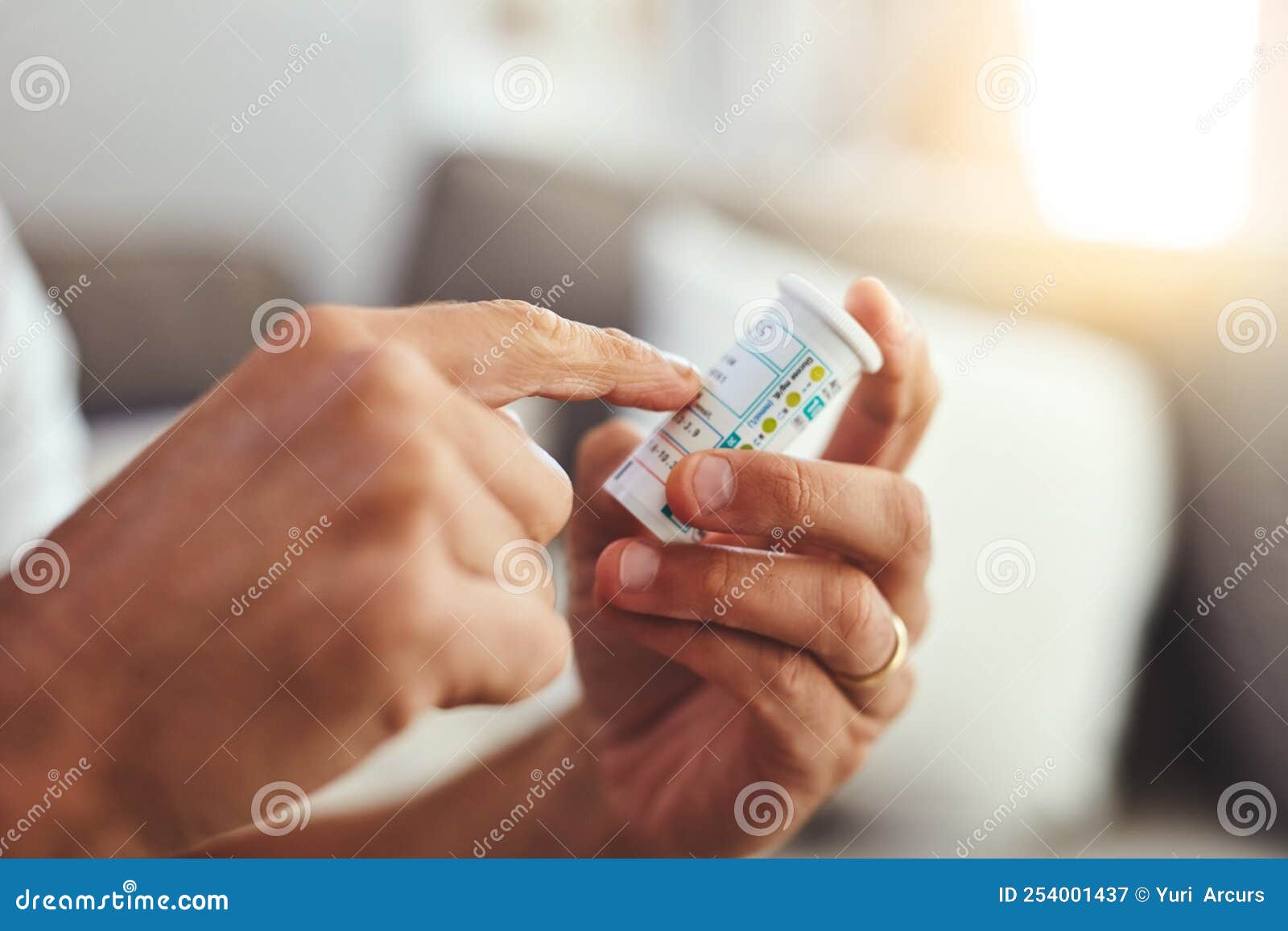 Checking the Dosage. an Unrecognizable Young Man about To Take His ...