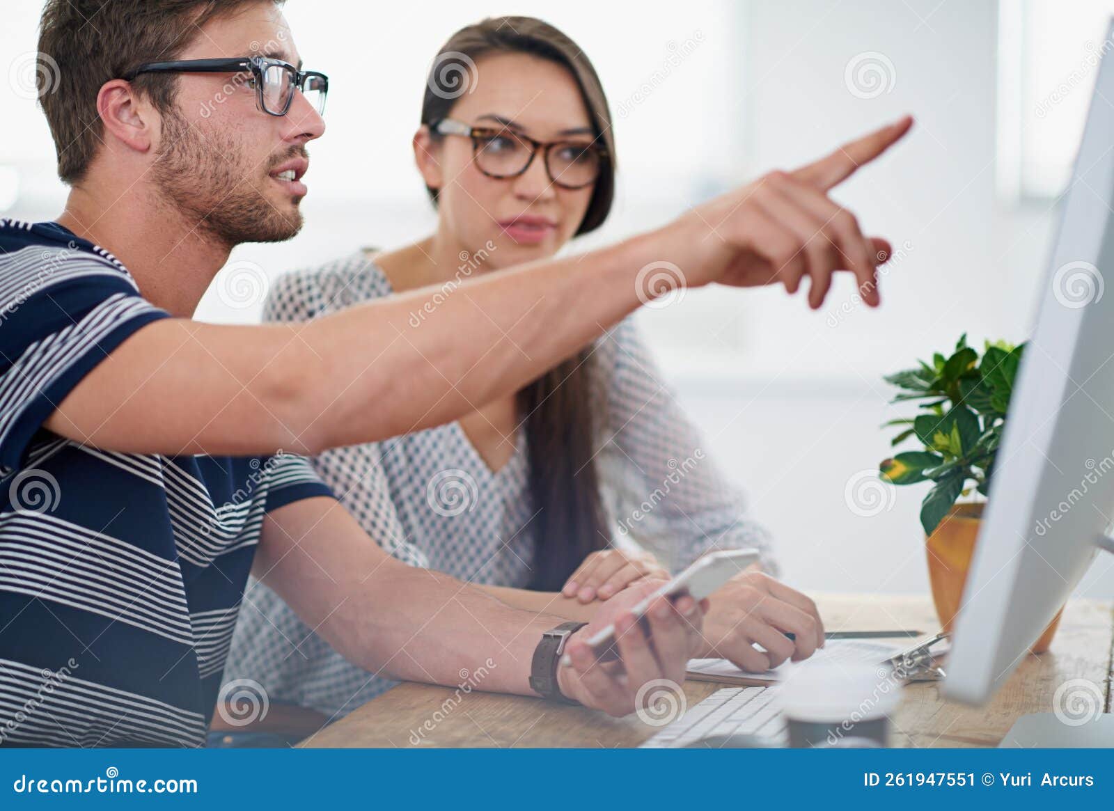 Checking and Double Checking the Project. Two Coworkers Working at a ...