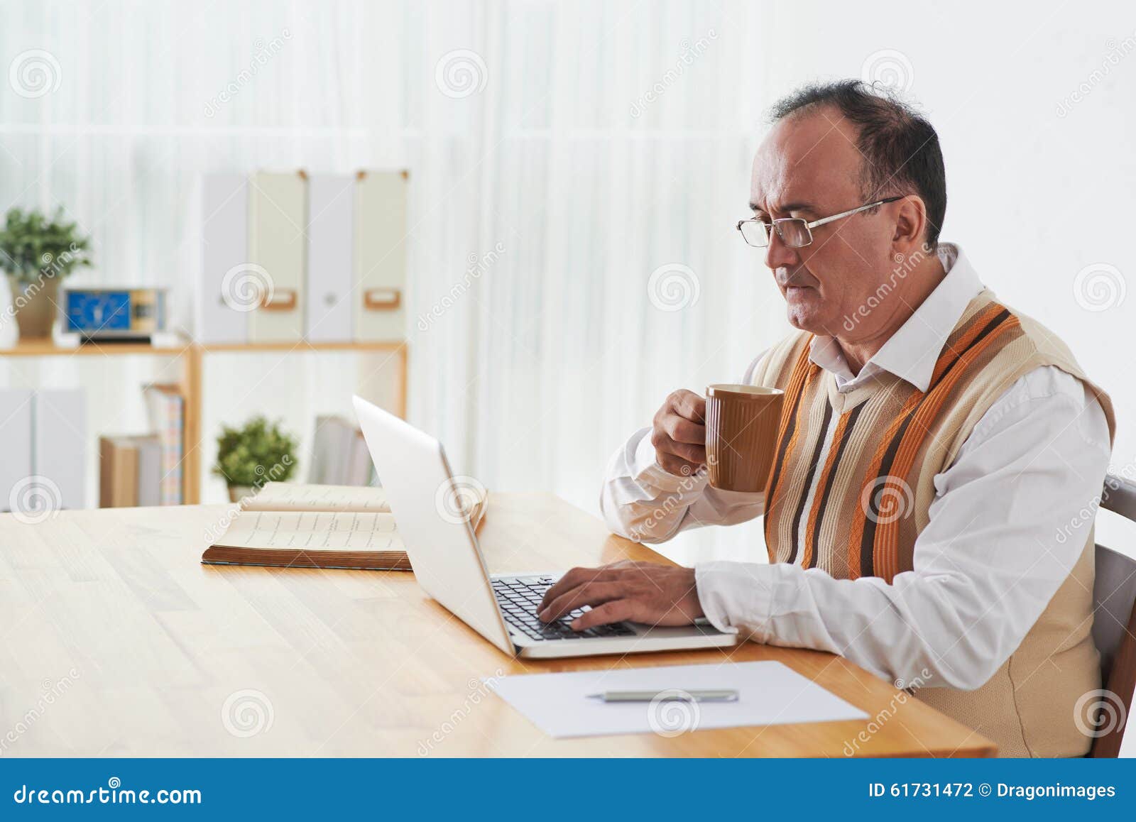 Checking e-mail stock photo. Image of workplace, drink - 61731472